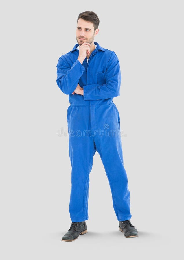 Happy Mechanic Man Holding a Wrench Against Purple Background Stock ...