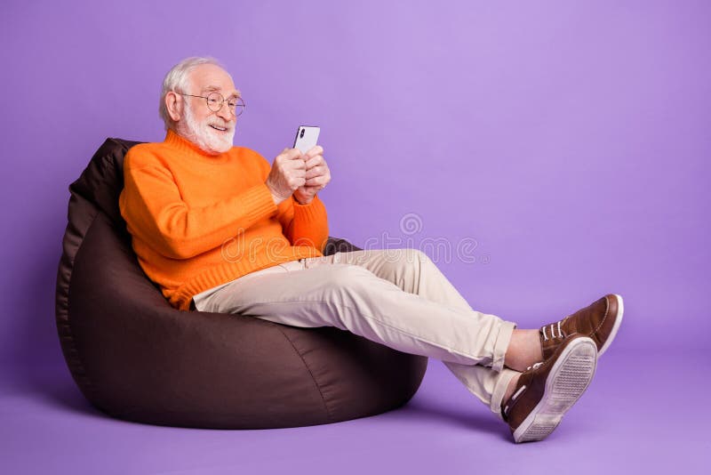 Full Body Profile Photo Of Handsome Cheerful Person Sit Soft Chair Wear