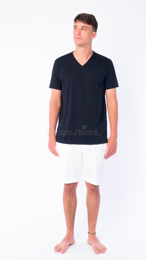 Full Body Shot Profile View of Young Handsome Man Looking at Camera ...