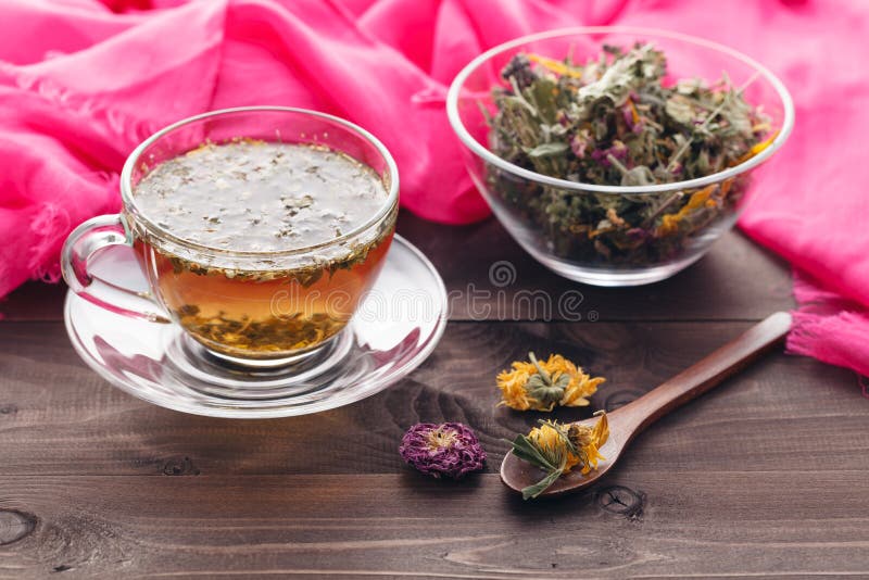 Full Bowl of Aromatic Herbs and Hot Tea on Table Stock Photo - Image of ...