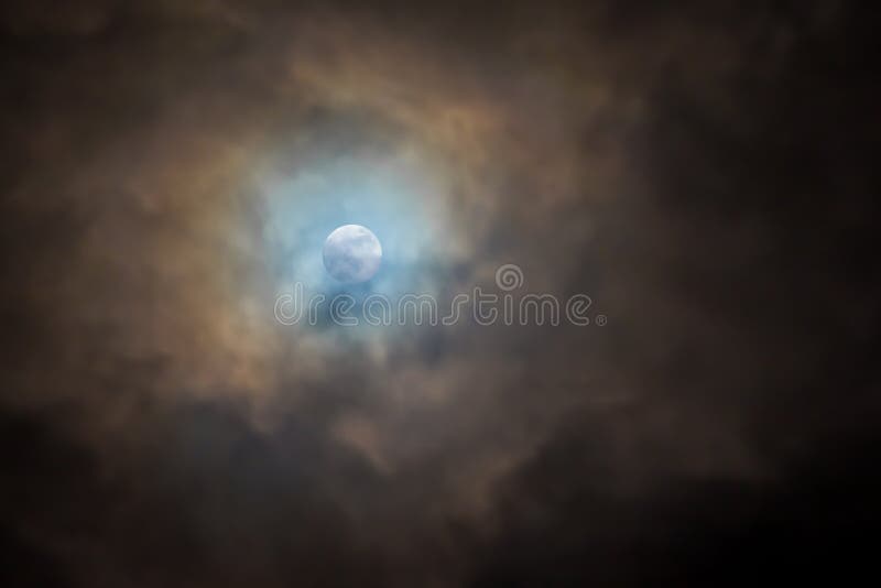 Full Bright Moon in a Dark Sky, Covered with Clouds_ Stock Photo ...