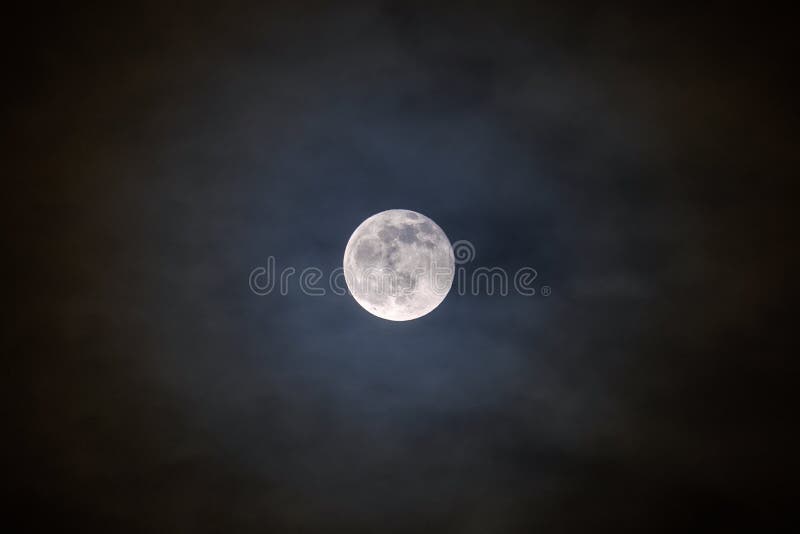 Full Bright Moon with Illuminated Clouds in Front of it Stock Image ...
