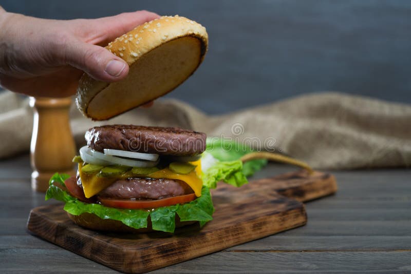 Full burger stock image. Image of addictive, gastronomy - 213481061