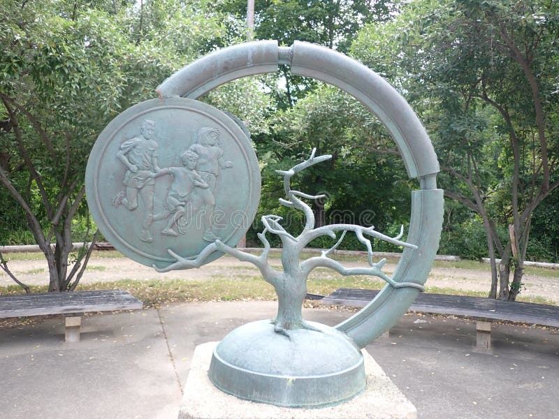 Art Sculpture -bare Tree, Partial Bike Tire with Medallion and 3 ...