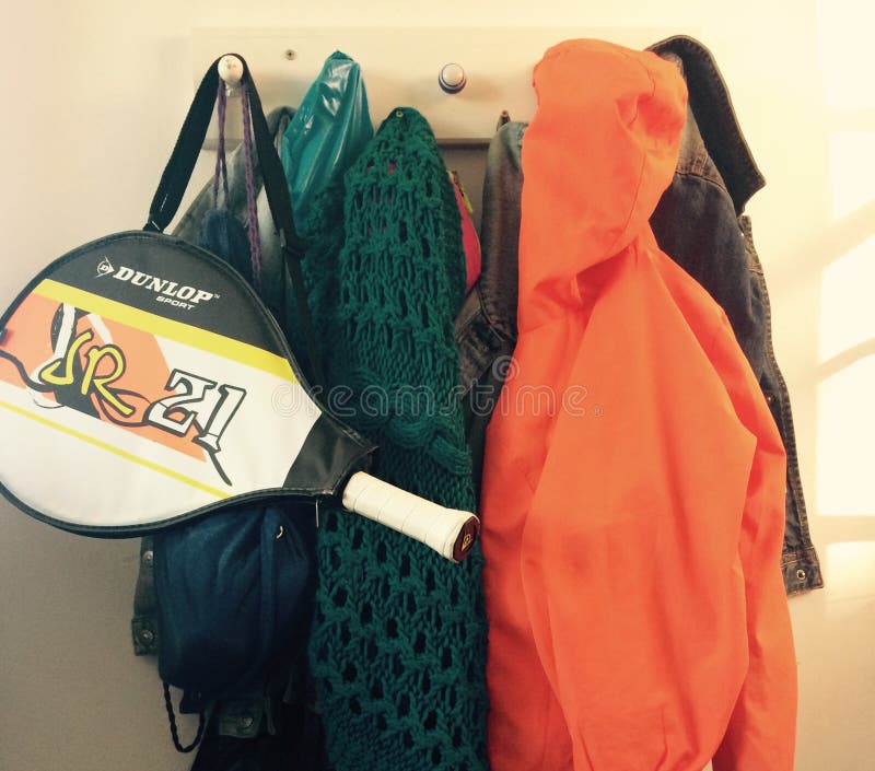 Full coat rack editorial photo. Image of tennis, coat - 73699681