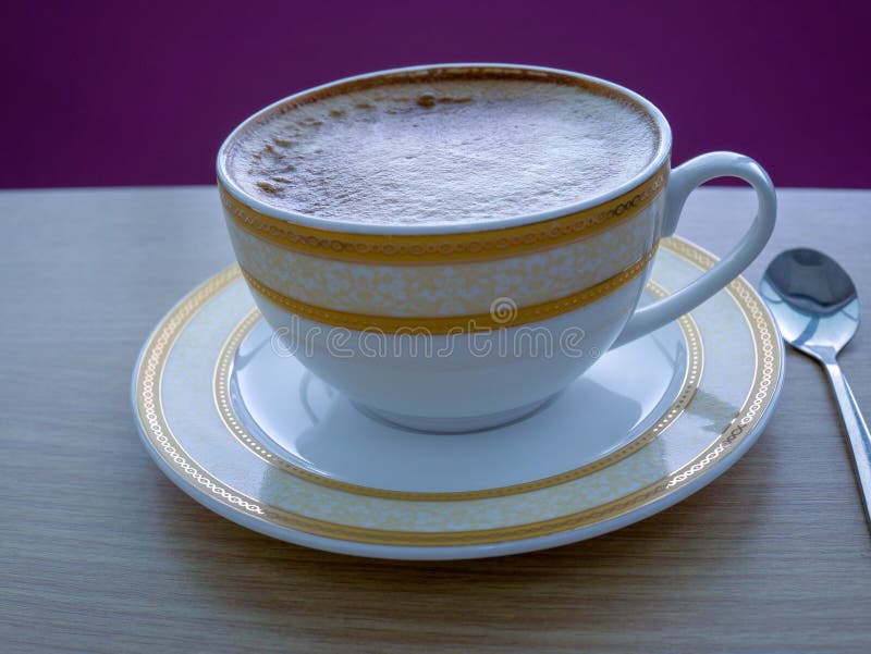 Full Coffee in Cup and Spoon on Wooden Table Stock Image - Image of ...