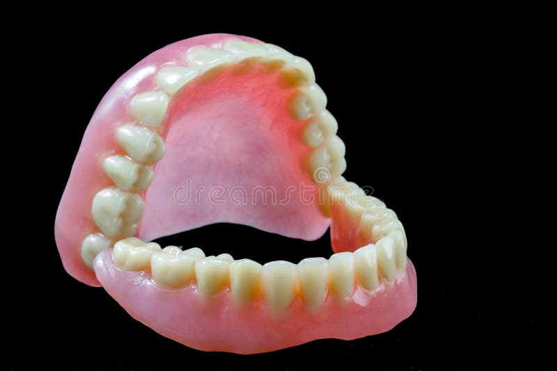 Full Denture on Black Background Stock Photo - Image of dentures ...