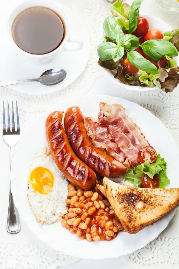 Full English Breakfast with Bacon, Sausage, Fried Egg and Baked Beans ...
