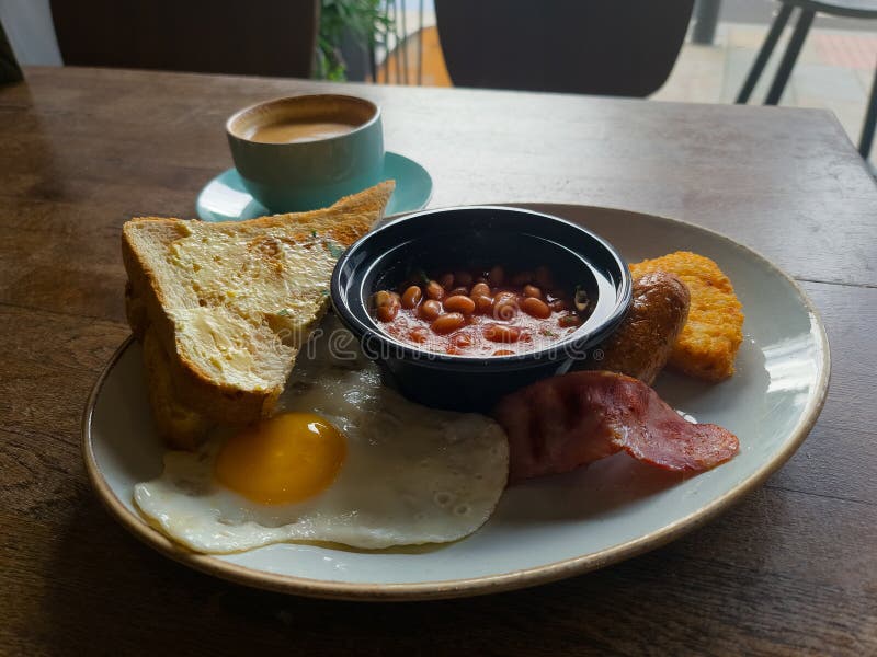 Full English Breakfast with Beans and Sausage Served on Wooden Table ...