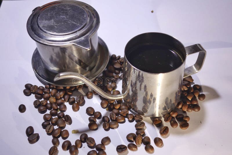 Full Fill of Black Coffee on Pot Surrounded by Coffee Beans Stock Image ...