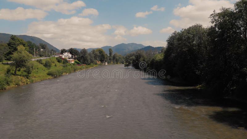 A Full-flowing River Flows Past the Trees. Stock Image - Image of ...