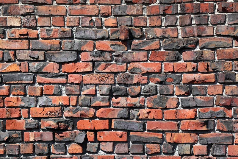 Full Frame Background Red Brick Wall Scorched by Fire. Stock Image ...