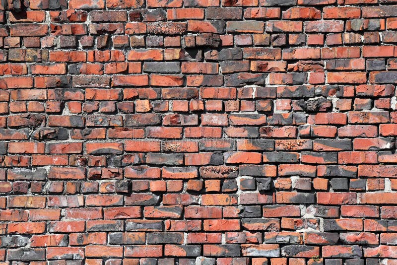 Full Frame Background Red Brick Wall Scorched by Fire. Stock Image ...