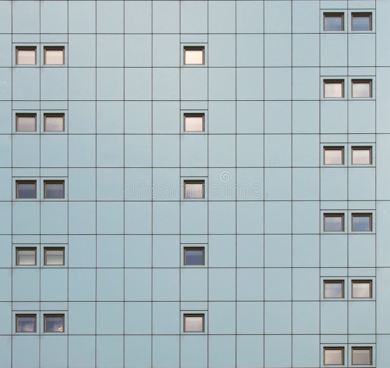 Facade of a Modern Building with Geometric Metallic Cladding and ...
