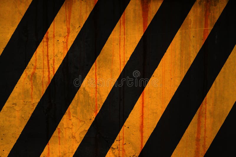 Concrete Wall Covered with Rust Stains and Paint in Yellow and Black ...