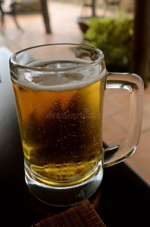 Full glass of fresh beer stock image. Image of sparkling - 50103899