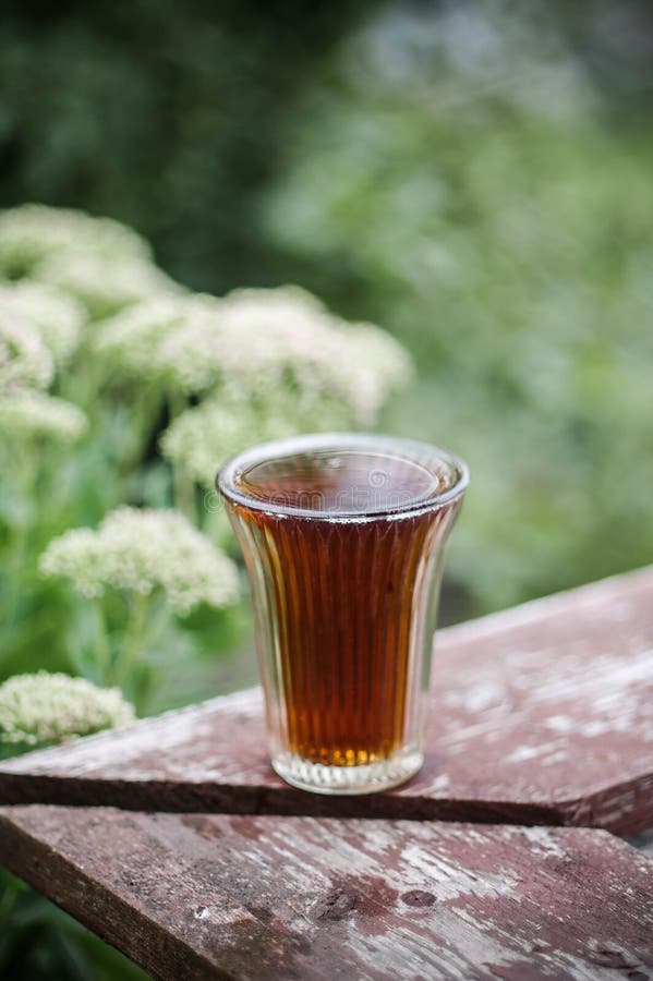 A Full Glass of Tea in a Natural Setting. Stock Photo - Image of ...