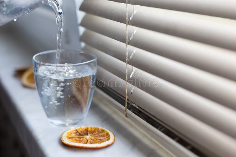 Full Glass of Water. Water Flow Fallen into the Glass Stock Image ...