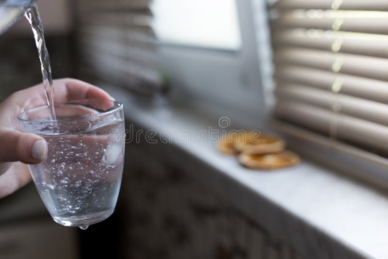 Full Glass of Water. Water Flow Fallen into the Glass Stock Image ...