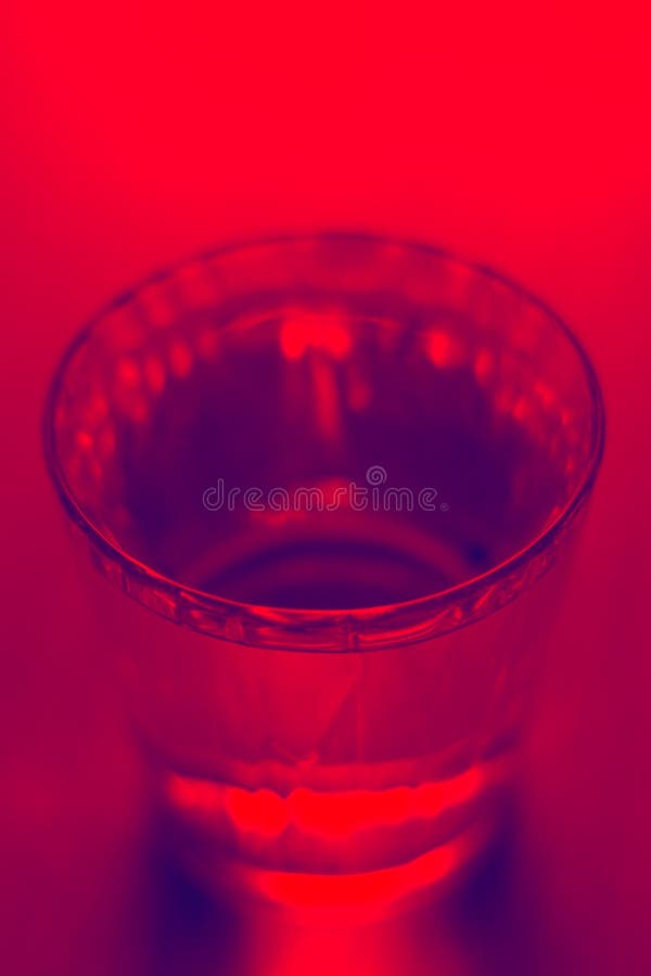Full Glass of Water on the Table. Dark Red Tone Stock Photo - Image of ...