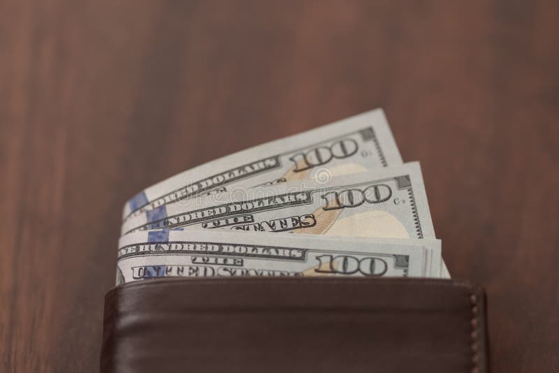 Full Grain Leather Wallet with Us Dollars on Walnut Table Stock Image ...