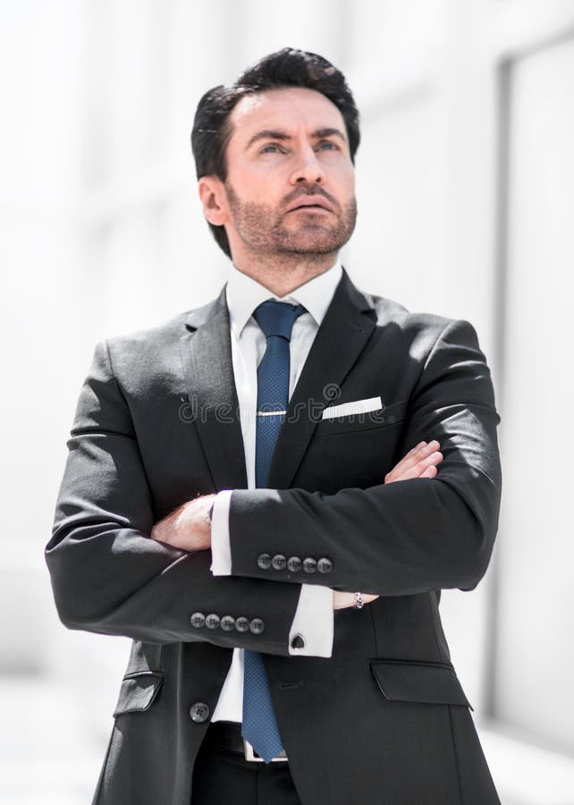 In Full Growth.confident Businessman Looking Ha Copy Space Stock Photo ...