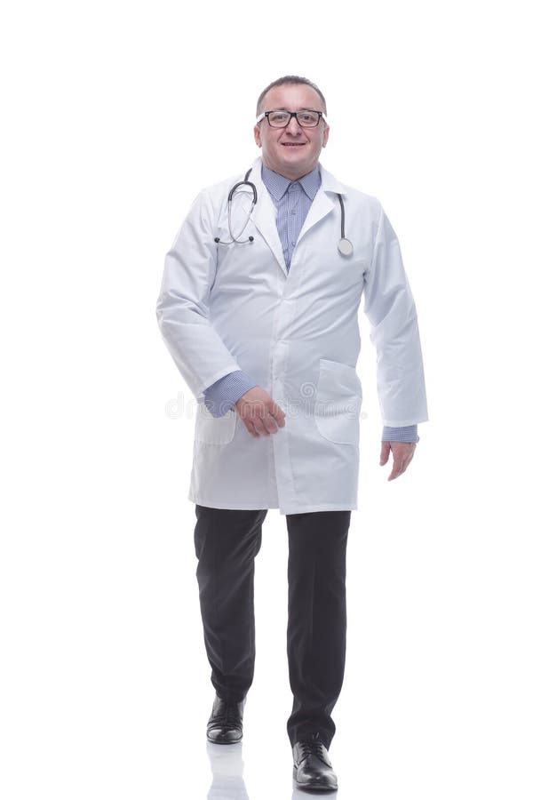 In Full Growth. Confident Male Doctor Striding Forward Stock Photo ...