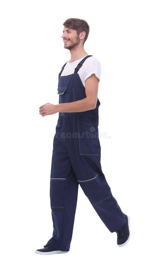 In Full Growth.smiling Man in Blue Work Suit Stepping Forward Stock ...