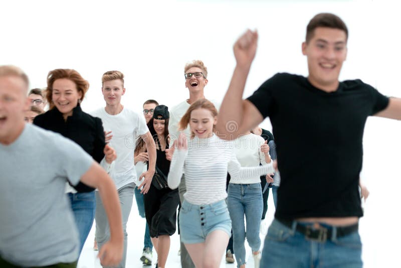 In Full Growth. Smiling Young People Quickly Run Forward Stock Photo ...