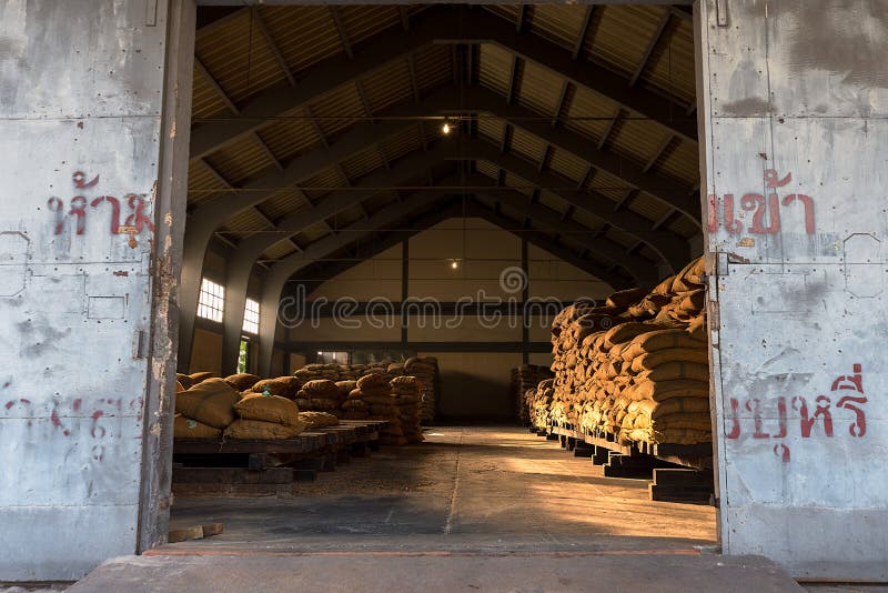 Full Hessian Sacks in a Warehouse Stock Photo - Image of bags, pallets ...