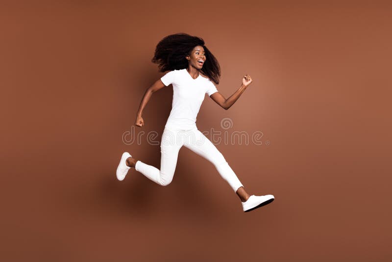 Motivated Fit Brown Haired Model In Sportswear Wearing Boxing Gloves
