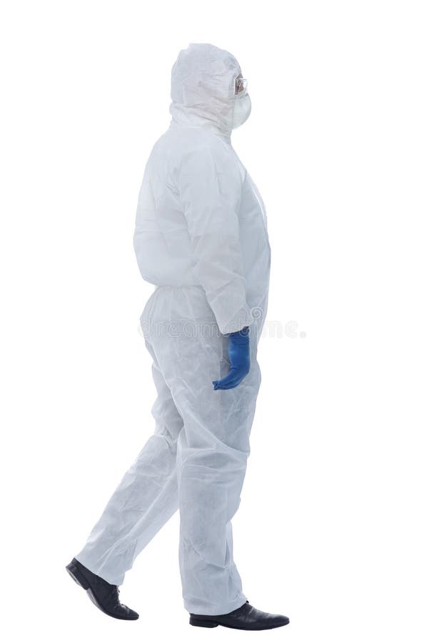 Full Length . Doctor in a Biological Protective Suit Striding Forward ...