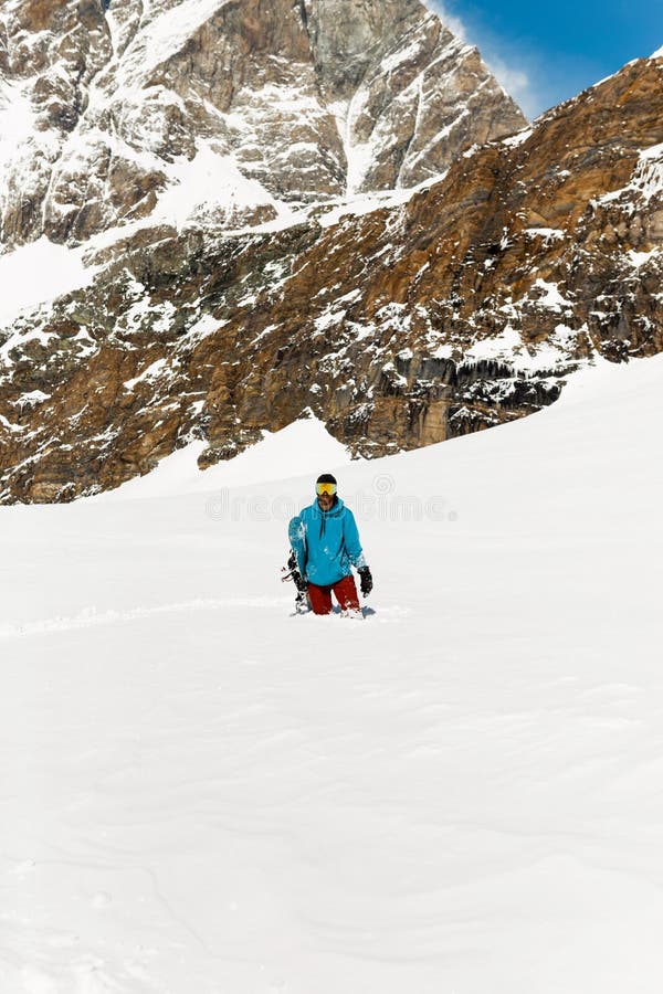 Full Length Image of a Snowboarding Standing in a Snow, High Mountain ...