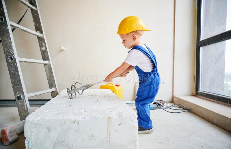 Child Using Construction Tool in Apartment Under Renovation. Stock ...