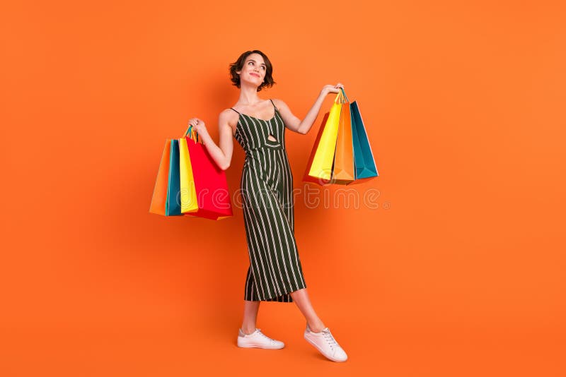 Full Length Photo Of Nice Brunette Millennial Lady Hold Bags Look Empty