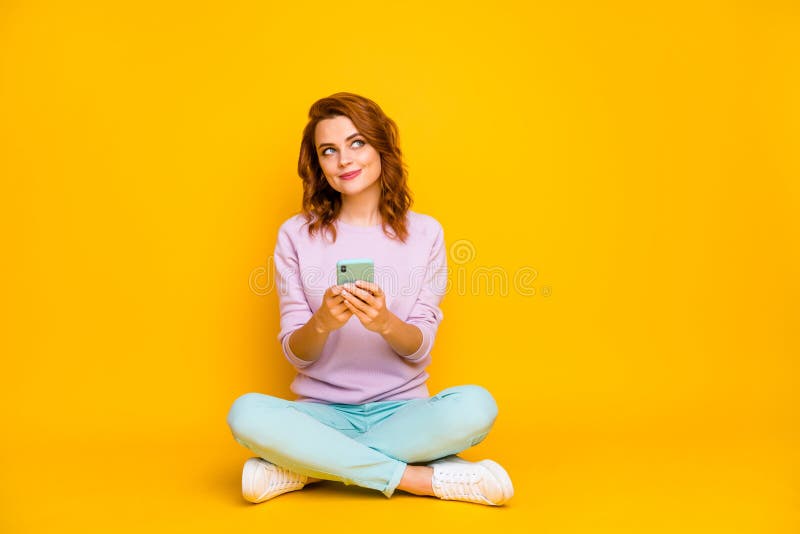 Full Length Photo Of Positive Cheerful Girl Sit Floor Legs Crossed