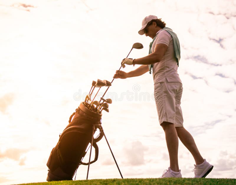 Man playing golf stock photo. Image of lifestyle, play - 100038794