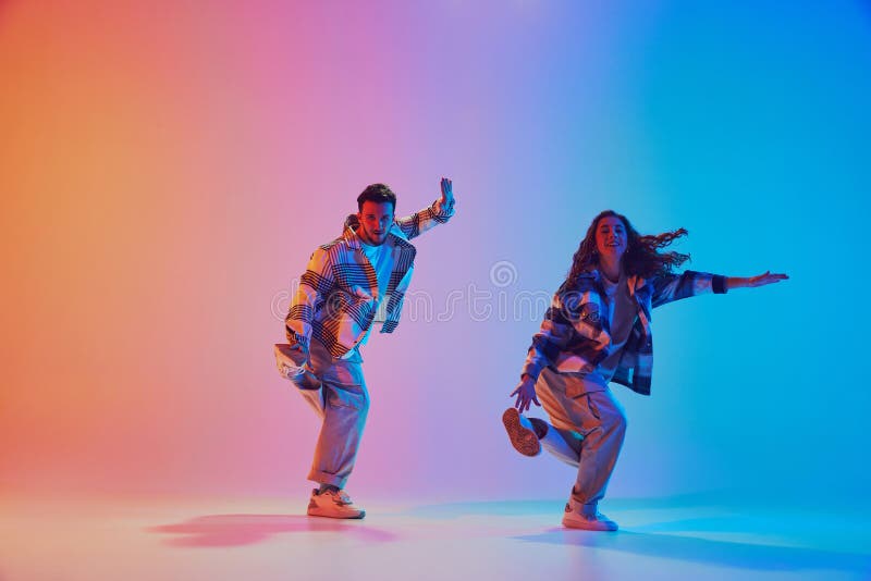 Full Length Portrait of Hip-hop Dancers Performing in Motion Against ...