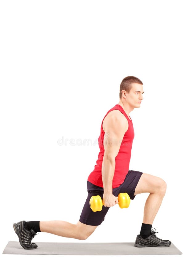 Full Length Portrait of a Young Man Exercising with Weights Stock Image ...