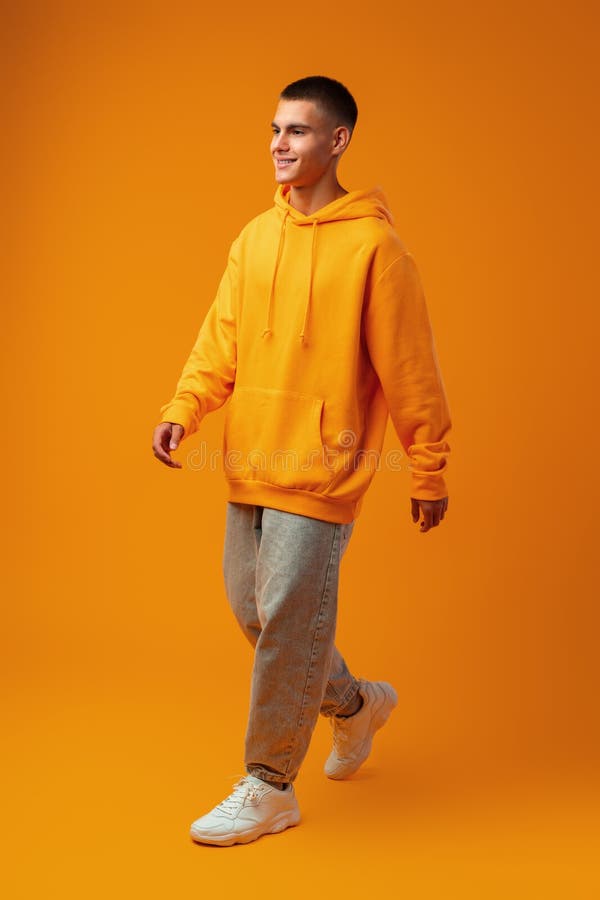Full Length Portrait of Young Man Standing on Yellow Background Stock ... Full Length Portrait of Young Man Standing on Yellow Background Stock ...