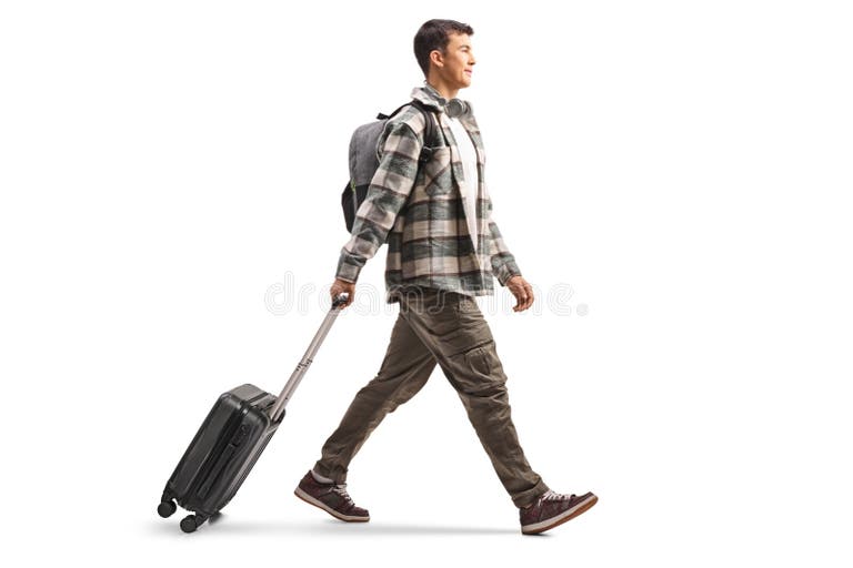 Full Length Profile Shot of a Student Pulling a Suitcase and Walking ...