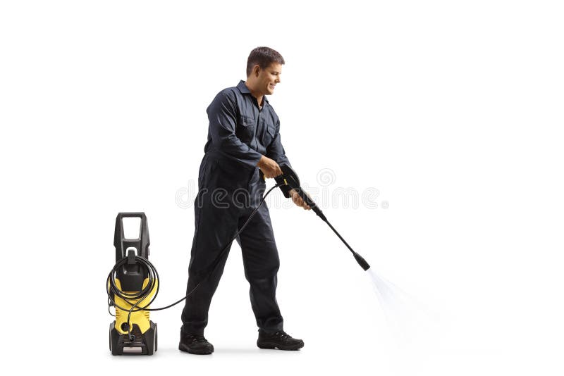 Full Length Profile Shot of a Worker in a Uniform Using a Pressure ...