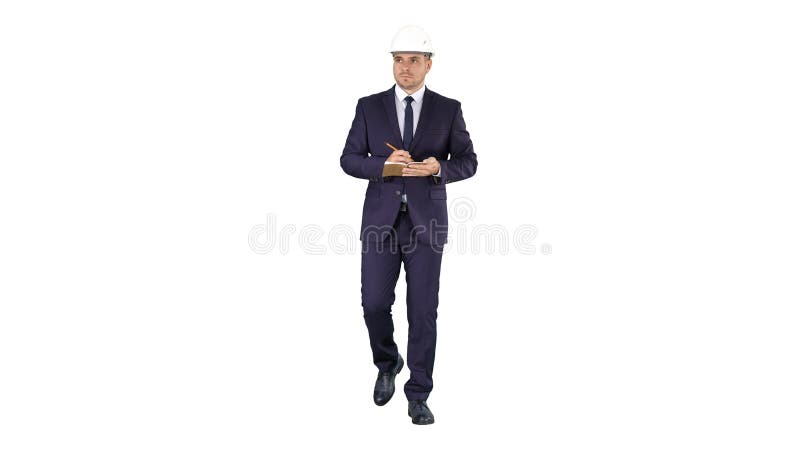 Engineer in Suit and Helmet Walking and Writing Notes in Notepad on ...