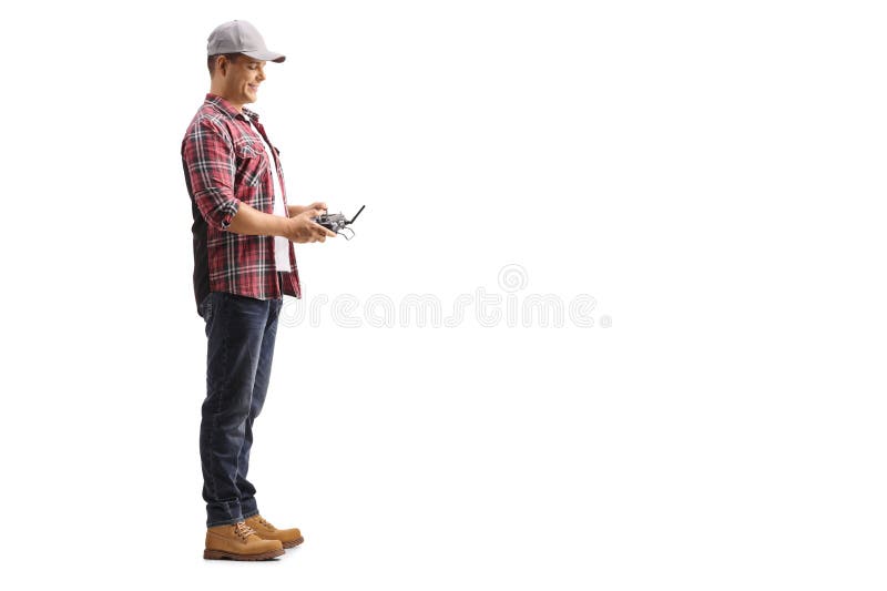 Full Length Shot of a Guy Holding a Drone Remote Controller Stock Photo ...