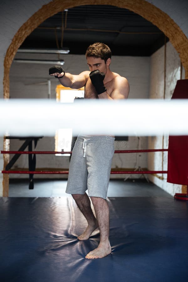 Full-length Shot of Man Kicking on Ring Stock Image - Image of male ...