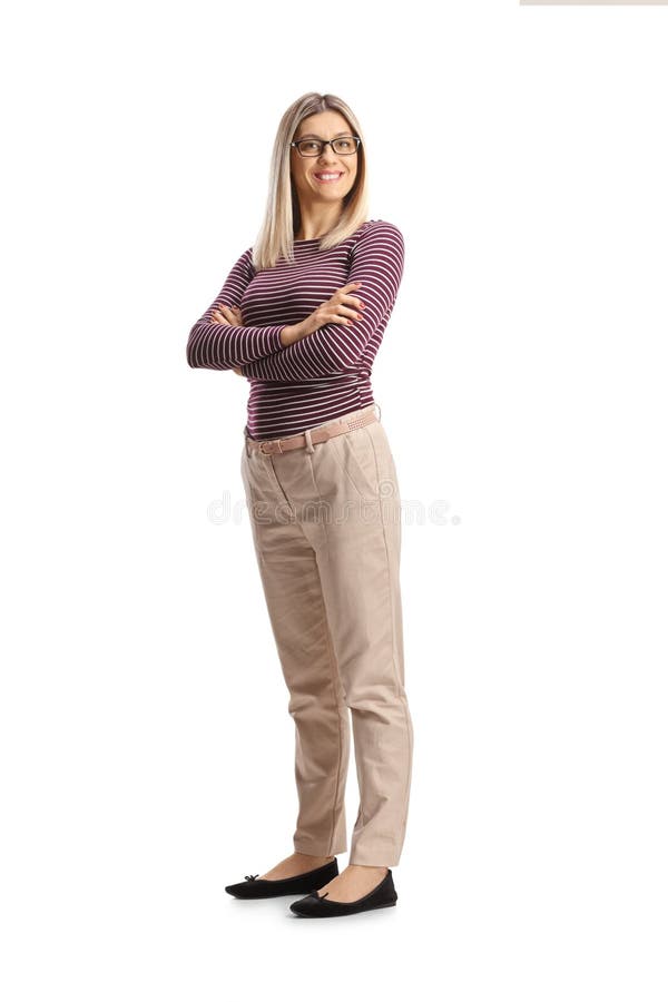 Full Length Shot of a Young Casual Woman Standing with Folded Arms ... Full Length Shot of a Young Casual Woman Standing with Folded Arms ...