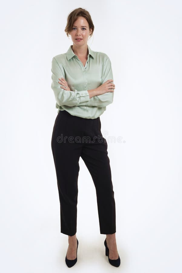 Full Lengt Shot of Confident Businesswoman Standing with Arms Crossed ... Full Lengt Shot of Confident Businesswoman Standing with Arms Crossed ...