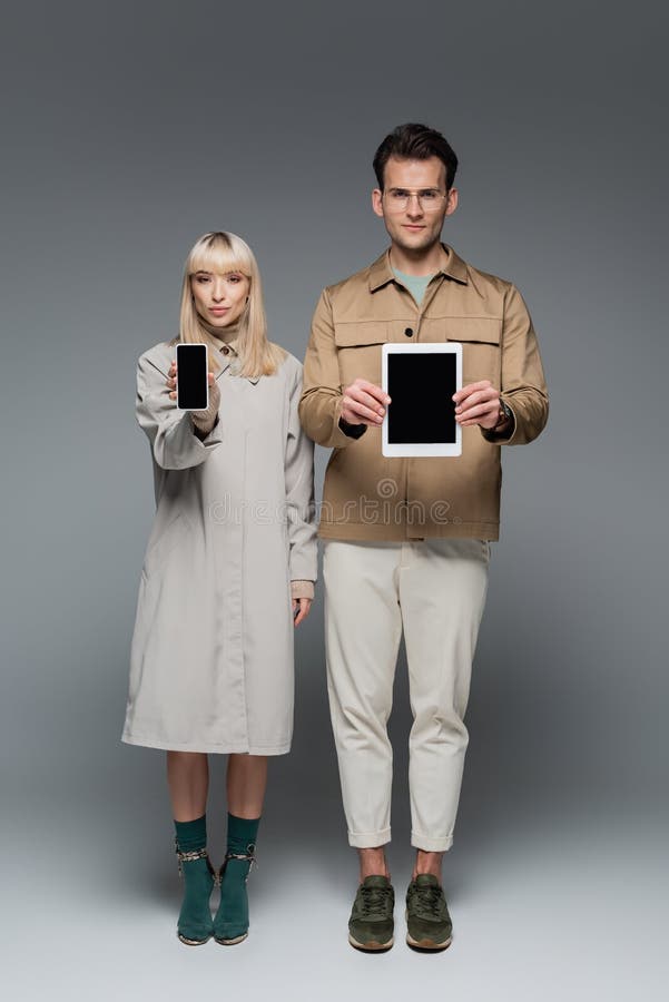 Full Length of Trendy Models Holding Stock Photo - Image of season ...