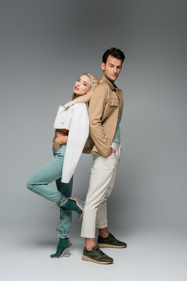 Full Length of Trendy Models Standing Stock Image - Image of grey, gray ...