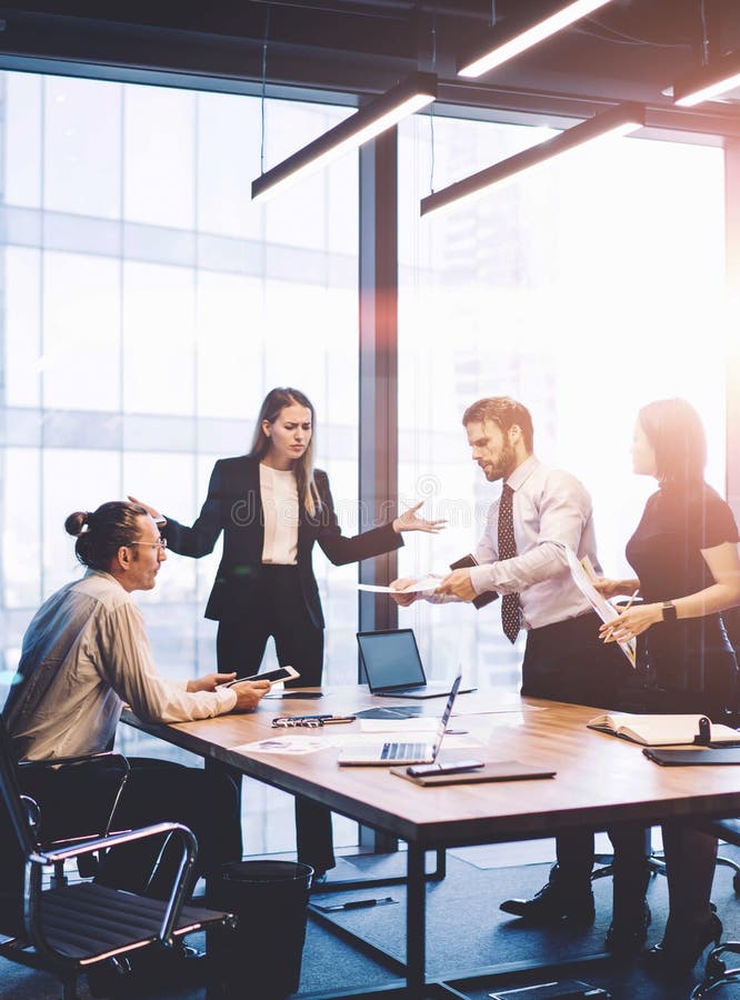 Full Length View of Business People Collaborating Around Table Stock ...